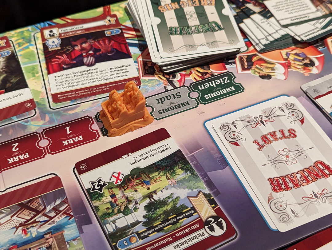 Unfair - Fiese Freizeitparks - Rezension - Brettspielpoesie