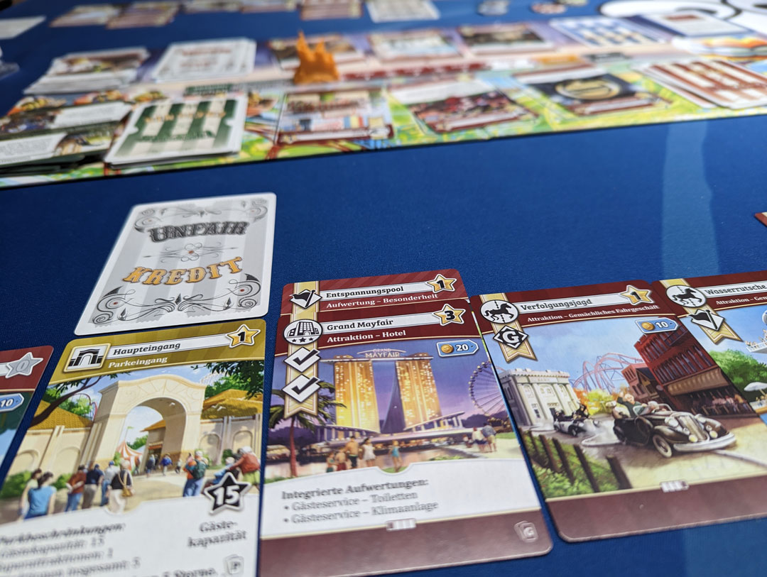 Unfair - Fiese Freizeitparks - Rezension - Brettspielpoesie